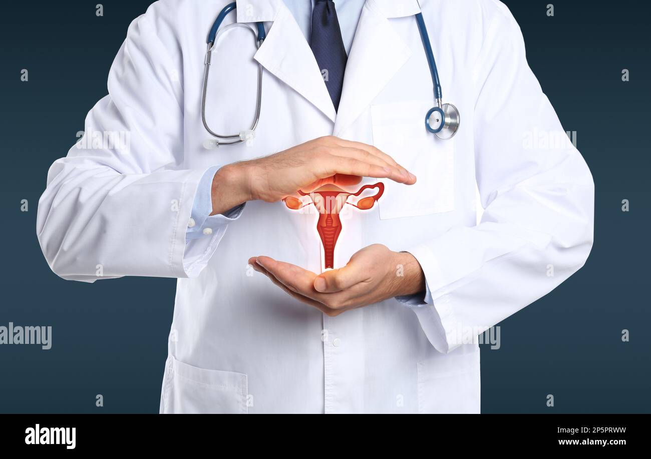 Doctor demonstrating virtual icon with illustration of female ...