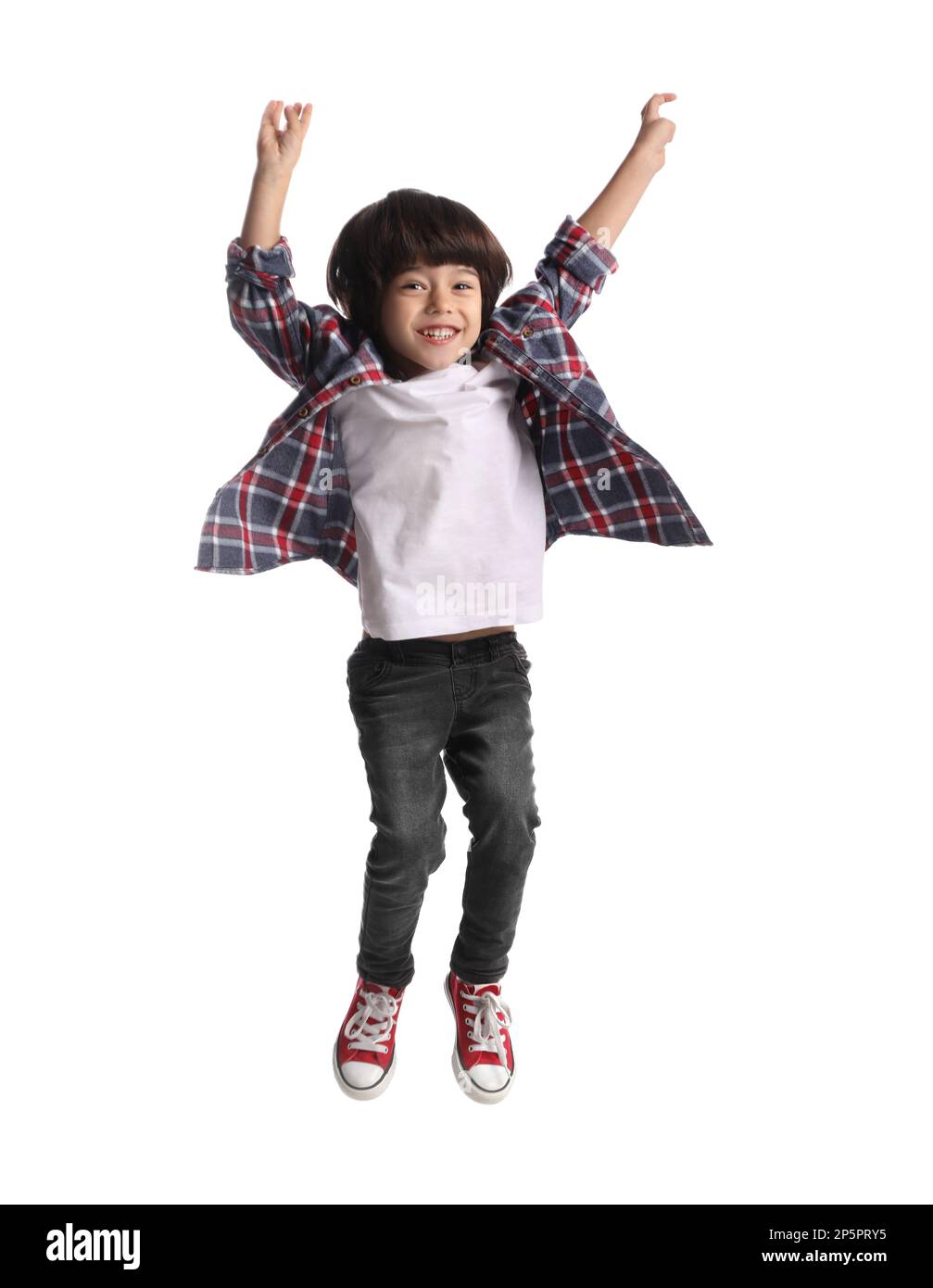 Cute little boy jumping on white background Stock Photo - Alamy