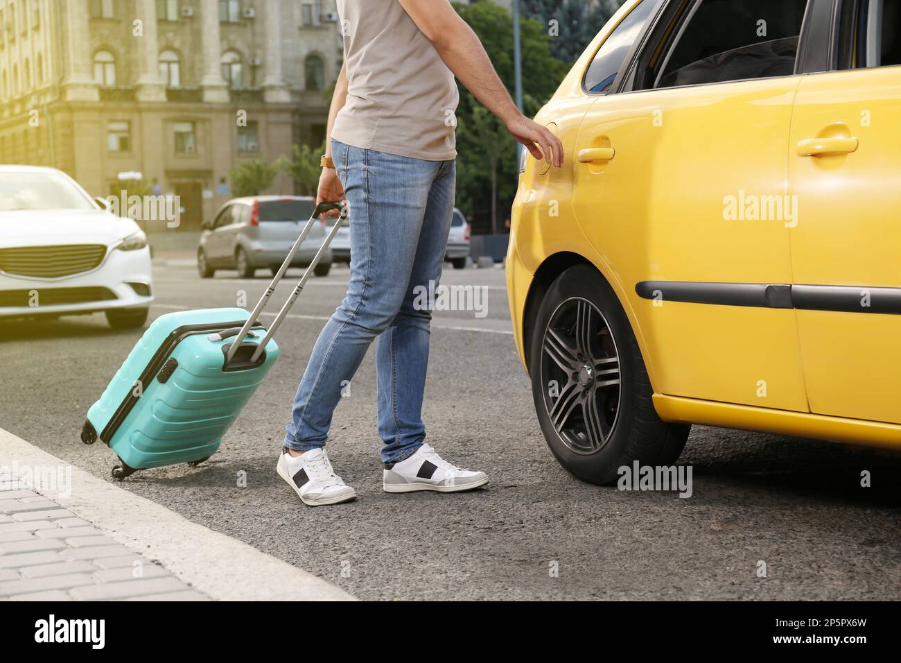 Man suitcase open door hi-res stock photography and images - Alamy