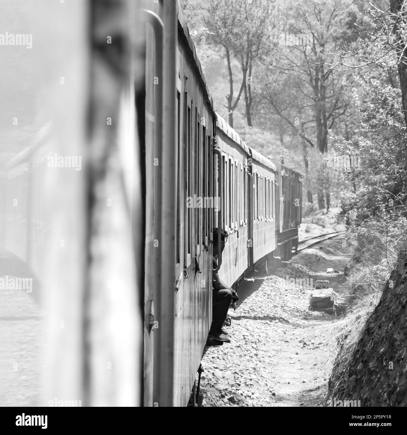 Toy Train moving on mountain slopes, beautiful view, one side mountain ...