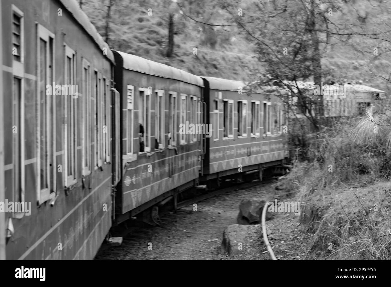 Toy Train moving on mountain slopes, beautiful view, one side mountain ...