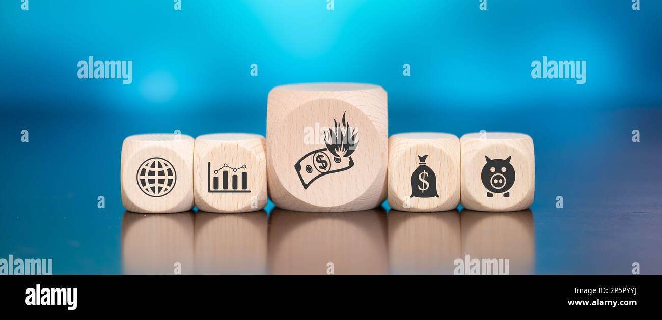 Wooden blocks with symbol of inflation concept on blue background Stock ...