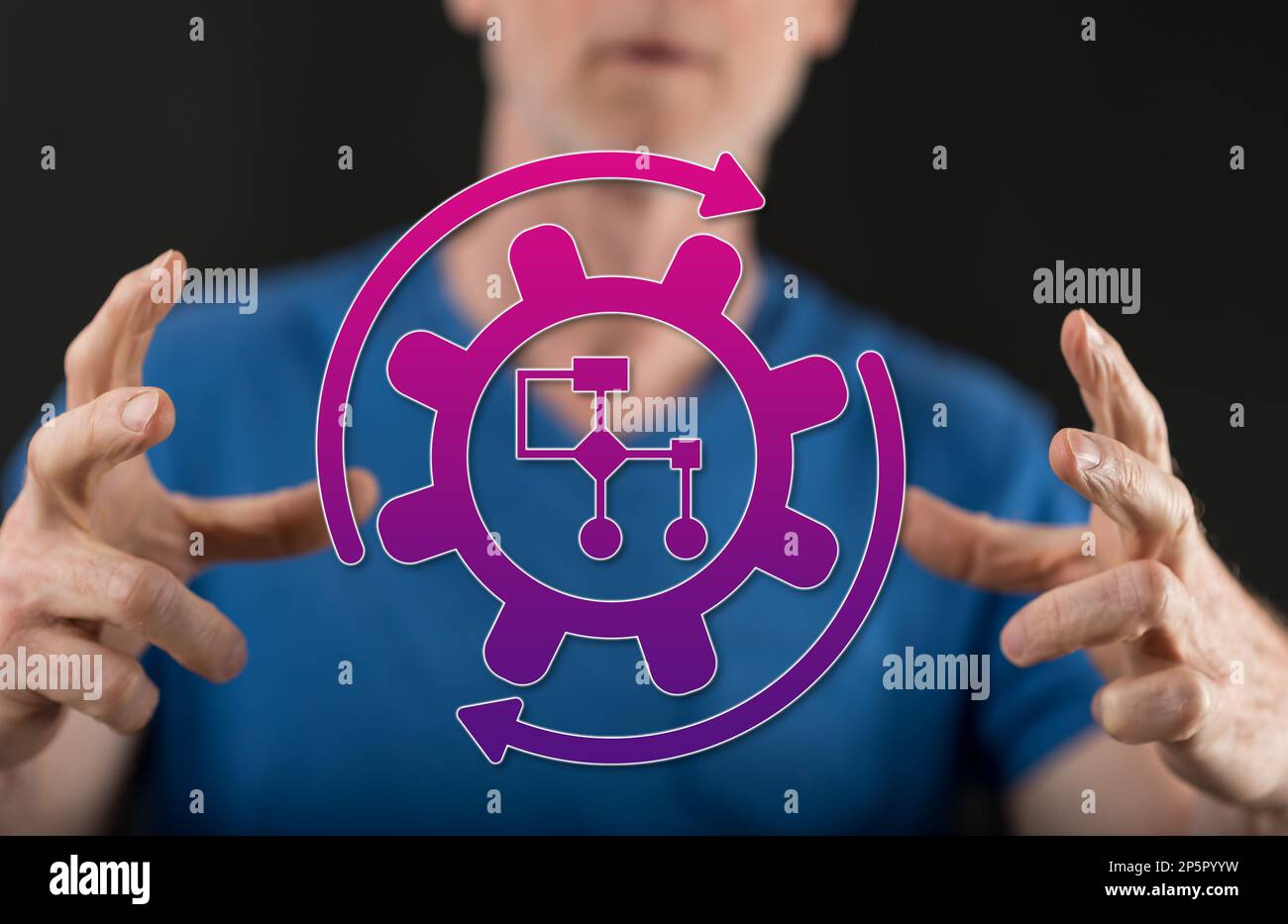 Workflow concept between hands of a man in background Stock Photo - Alamy