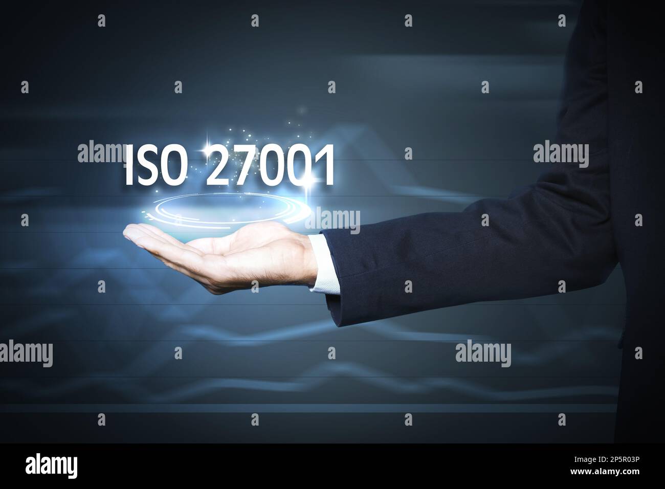 Man demonstrating at virtual icon with text ISO 27001, closeup Stock ...