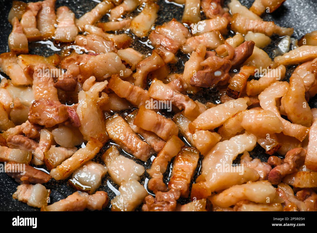 Frying cracklings in cookware, closeup. Pork lard Stock Photo - Alamy