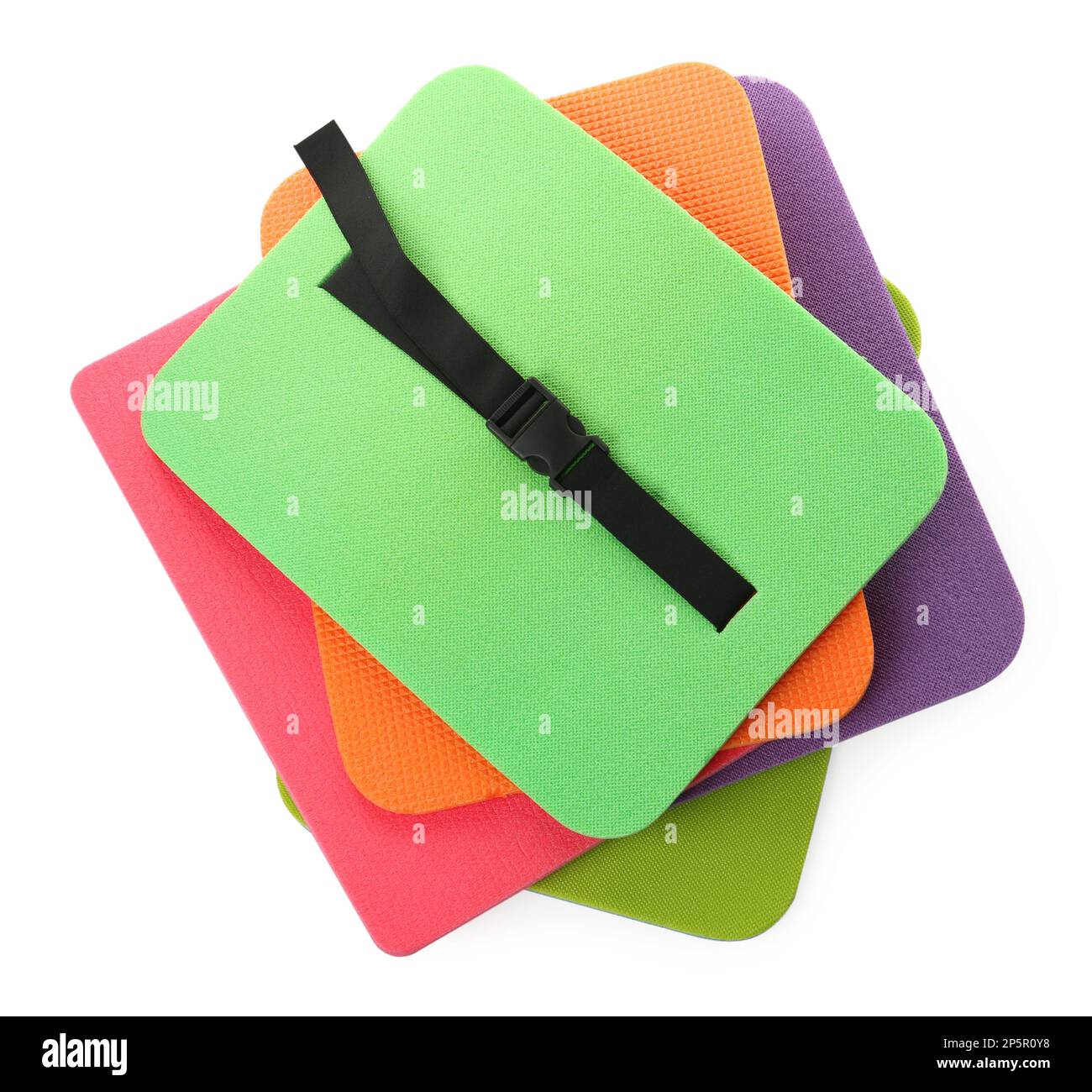 Bright foam tourist seat mats isolated on white, top view Stock Photo ...