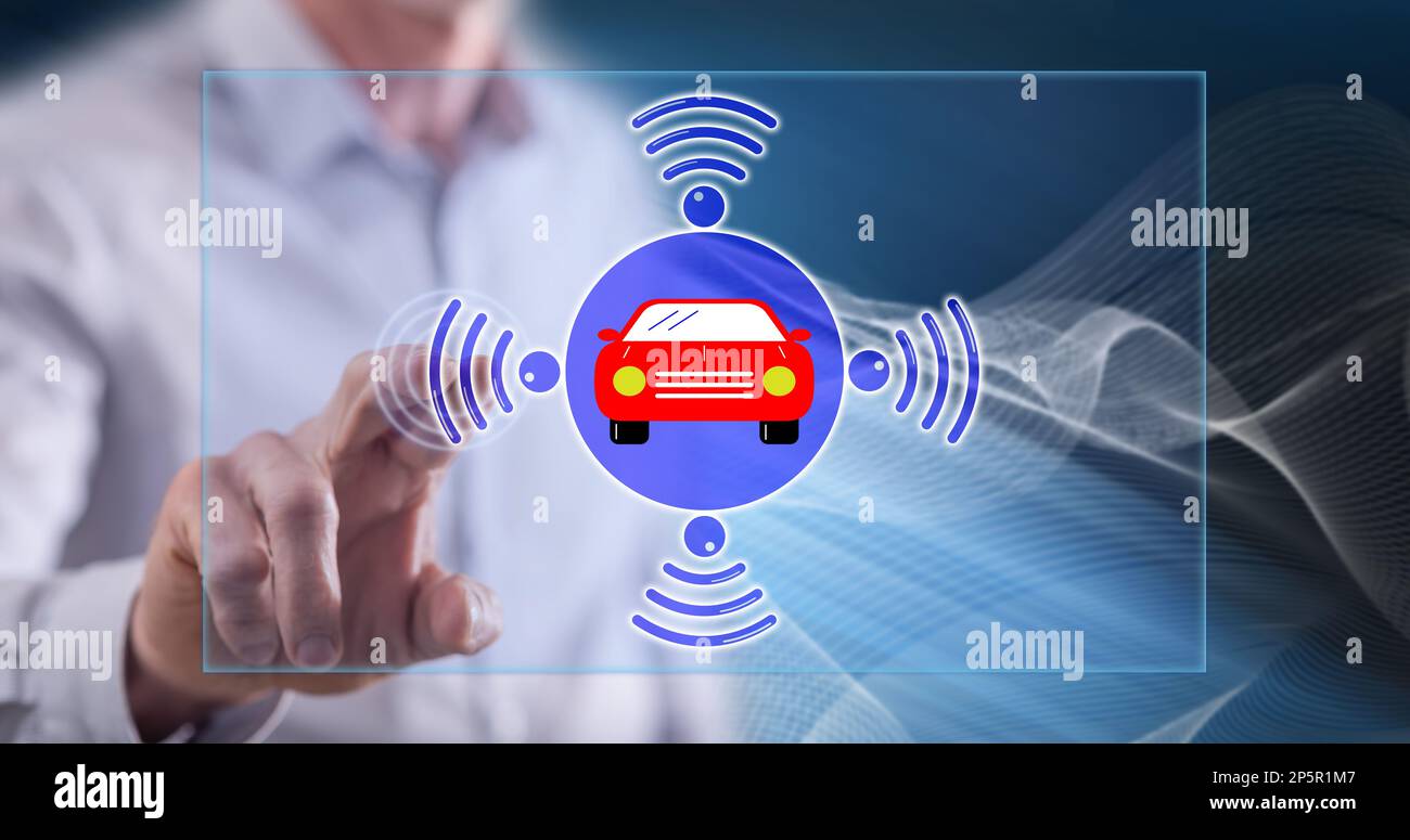 Man touching a smart car concept on a touch screen with his finger ...