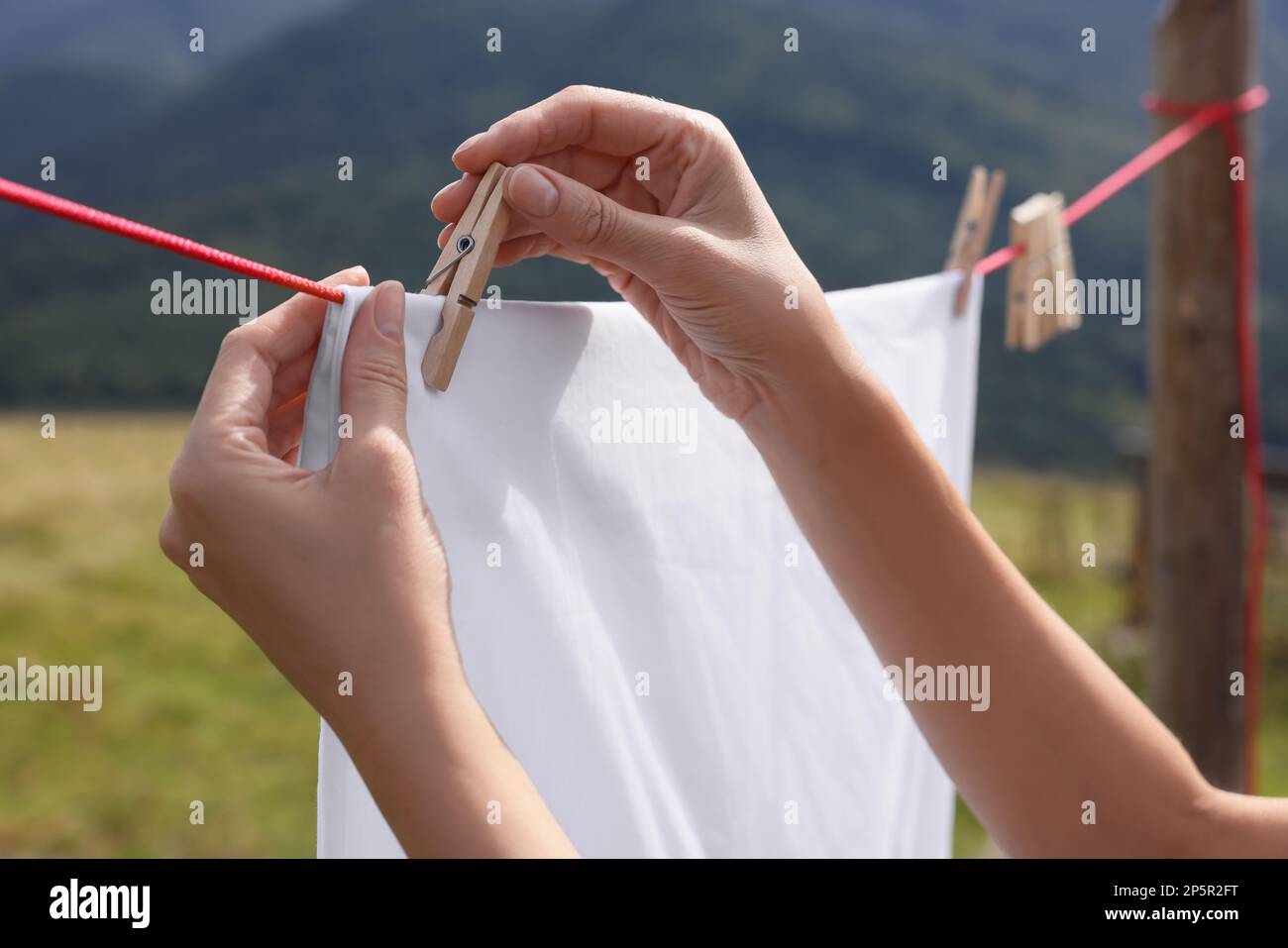 Laundry clothespin woman in hi-res stock photography and images - Alamy