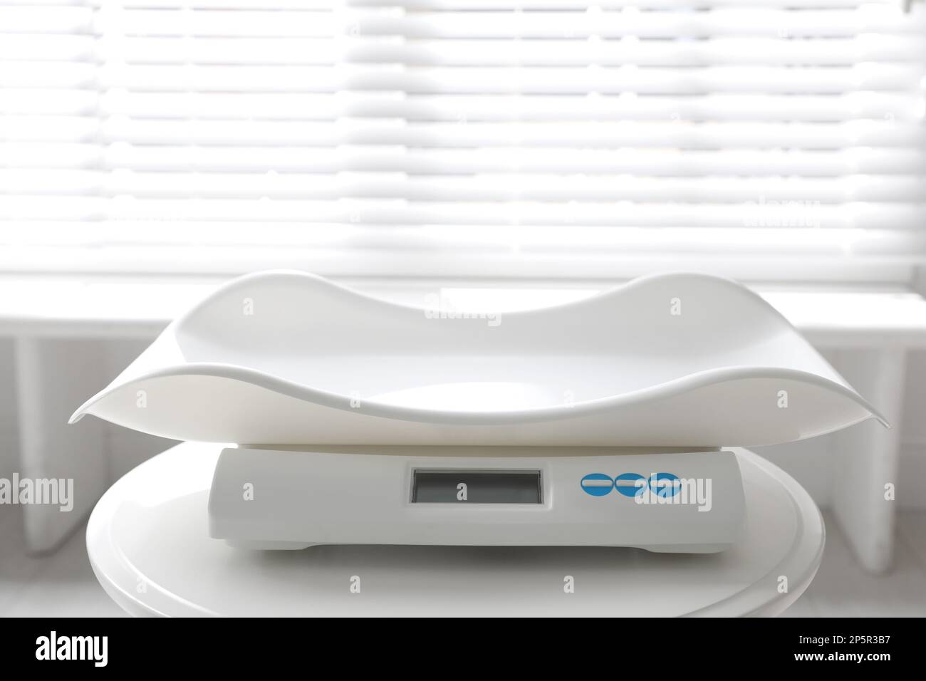 Baby scales hi-res stock photography and images - Alamy