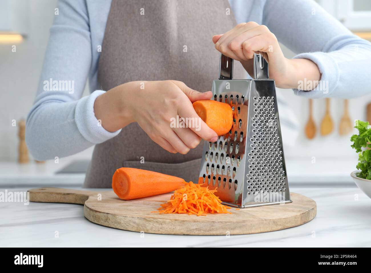 Carrot grating hi-res stock photography and images - Alamy