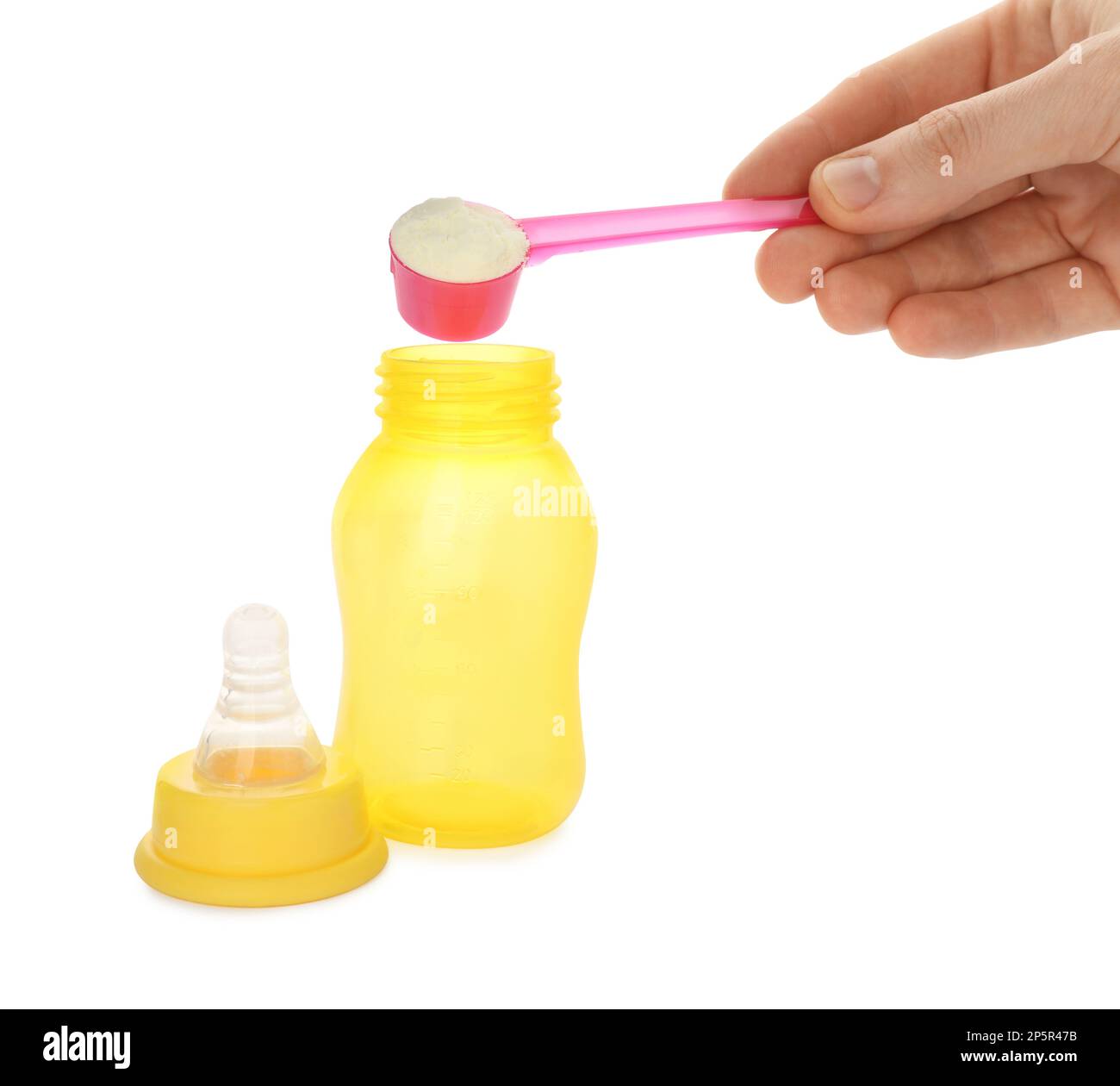 Woman preparing infant formula on white background, closeup. Baby milk ...