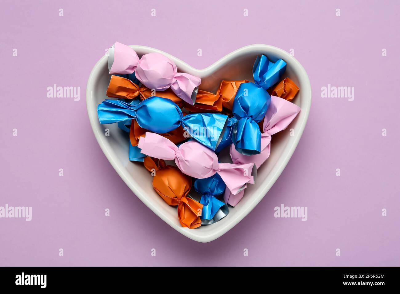 Candies in wrapper hi-res stock photography and images - Alamy