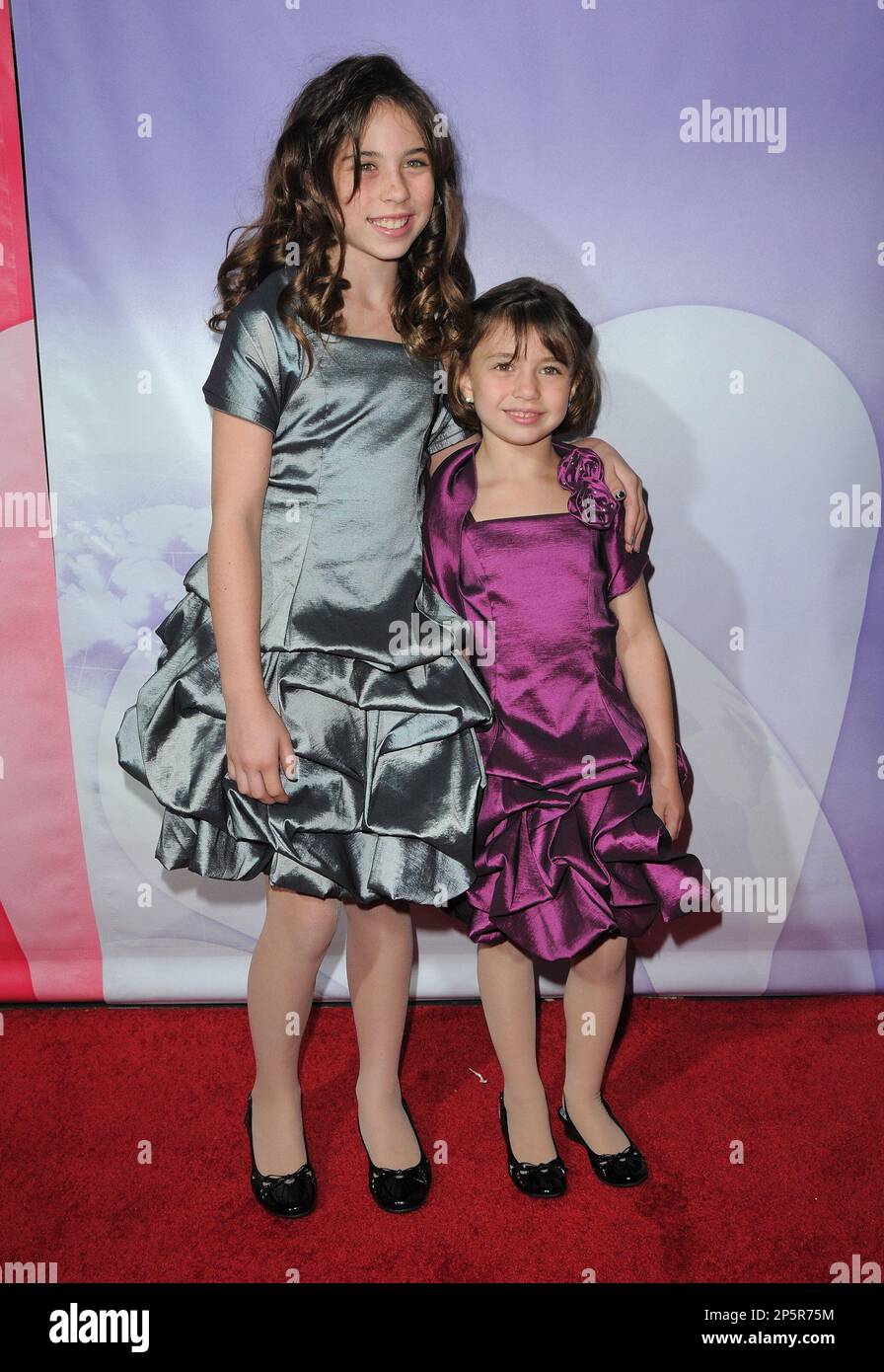 BEVERLY HILLS, CA - JULY 30: Actress Emily Evan Rae and Savannah Paige ...