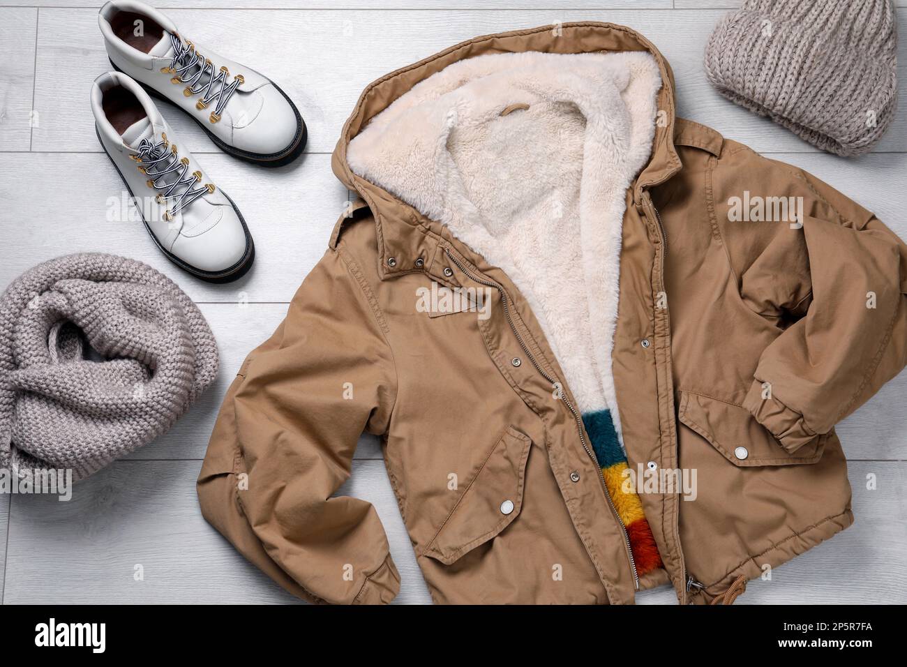 Winter fashion. Layout with women's outfit on white wooden background ...