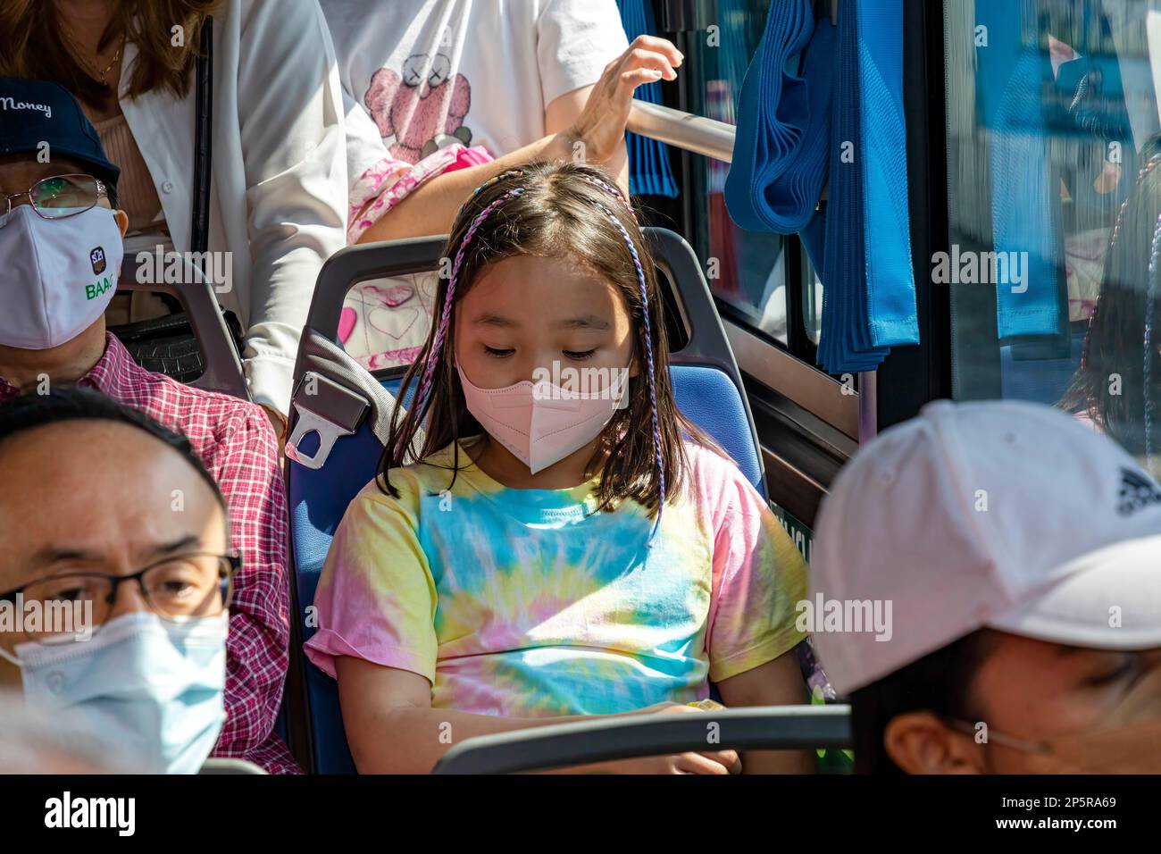 Foreign and Thai passengers on electric bus shuttle service, Bangkok ...
