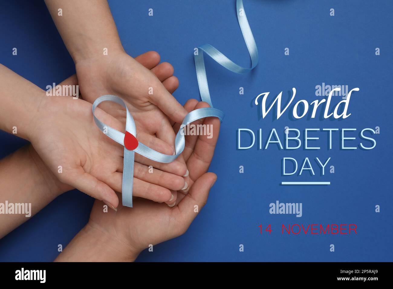 World Diabetes Day. People holding light blue ribbon with paper blood ...