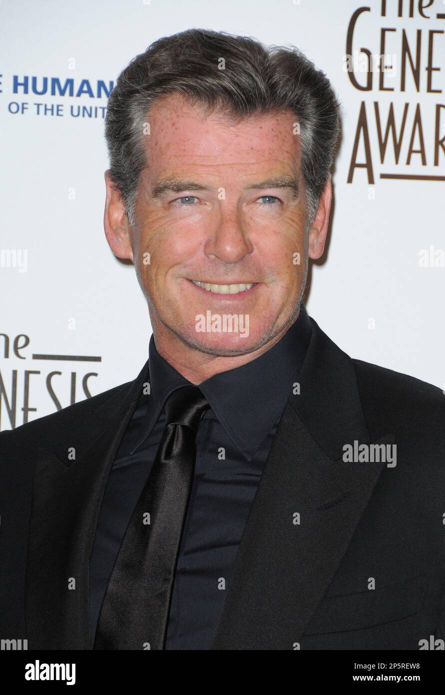BEVERLY HILLS, CA - MARCH 20: Actor Pierce Brosnan poses in the press ...