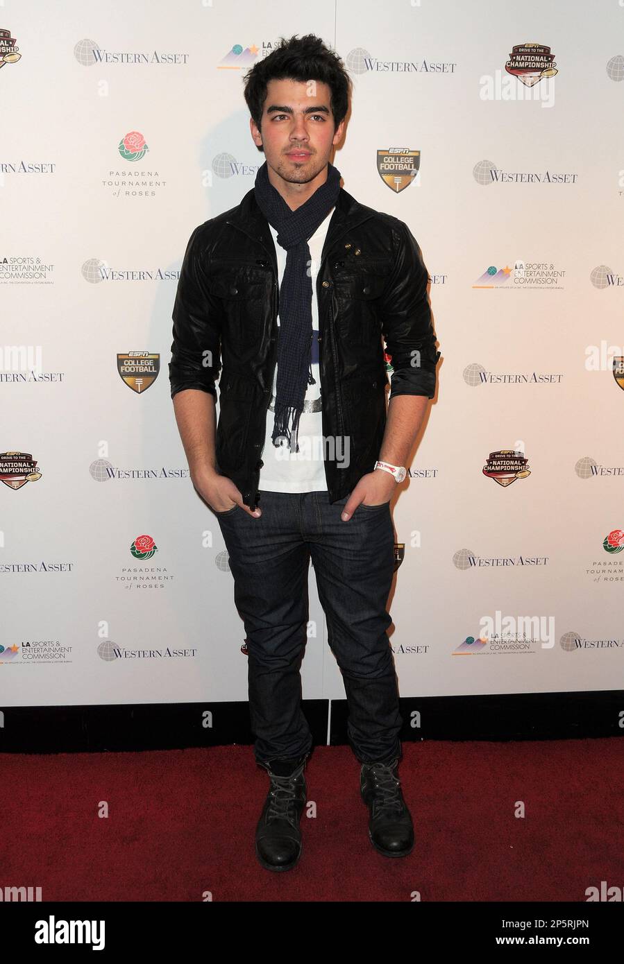 PASADENA, CA - JANUARY 06: Singer Joe Jonas arrives at The Official BCS ...