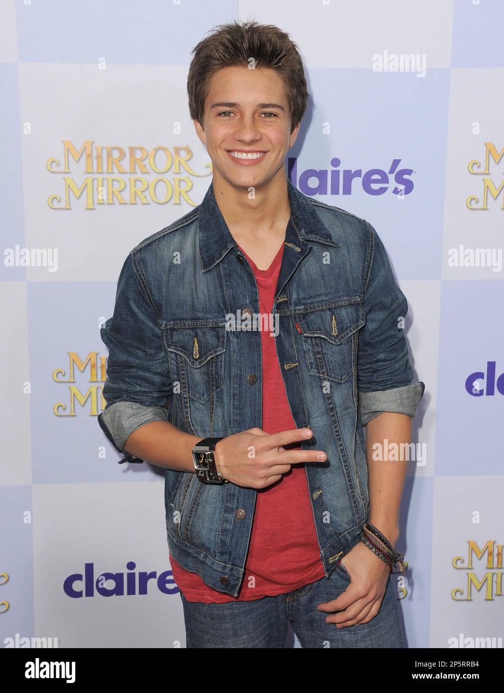 HOLLYWOOD, CA - MARCH 17: Actor Billy Unger arrives at the "Mirror Mirror" Los Angeles Premiere ...