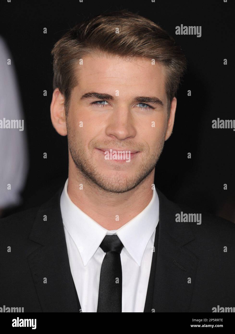 LOS ANGELES, CA - MARCH 12: Actor Liam Hemsworth arrives at "The Hunger ...