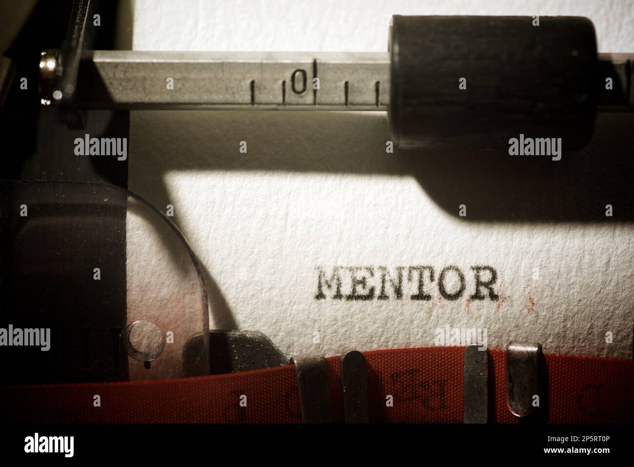 Mentor word written with a typewriter Stock Photo - Alamy