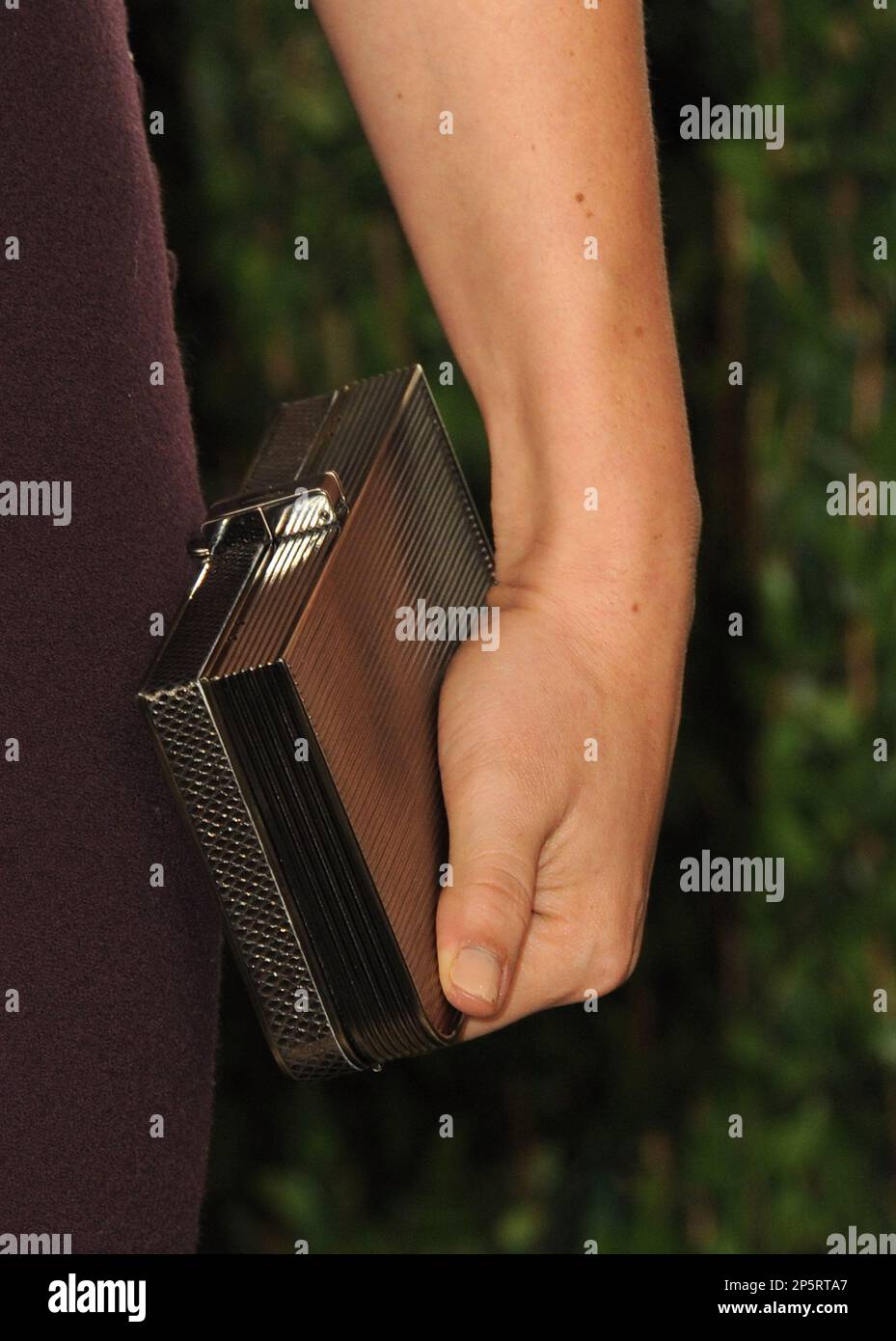 WEST HOLLYWOOD, CA - FEBRUARY 26: Actress Maya Rudolph (handbag detail ...