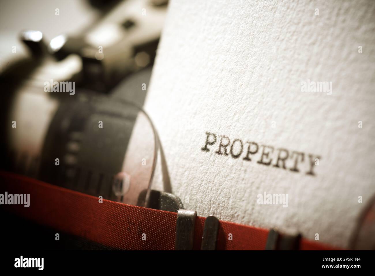 Property word written with a typewriter Stock Photo - Alamy