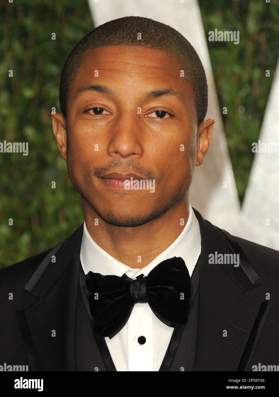 WEST HOLLYWOOD, CA - FEBRUARY 26: Rapper Pharrell Williams arrives at ...