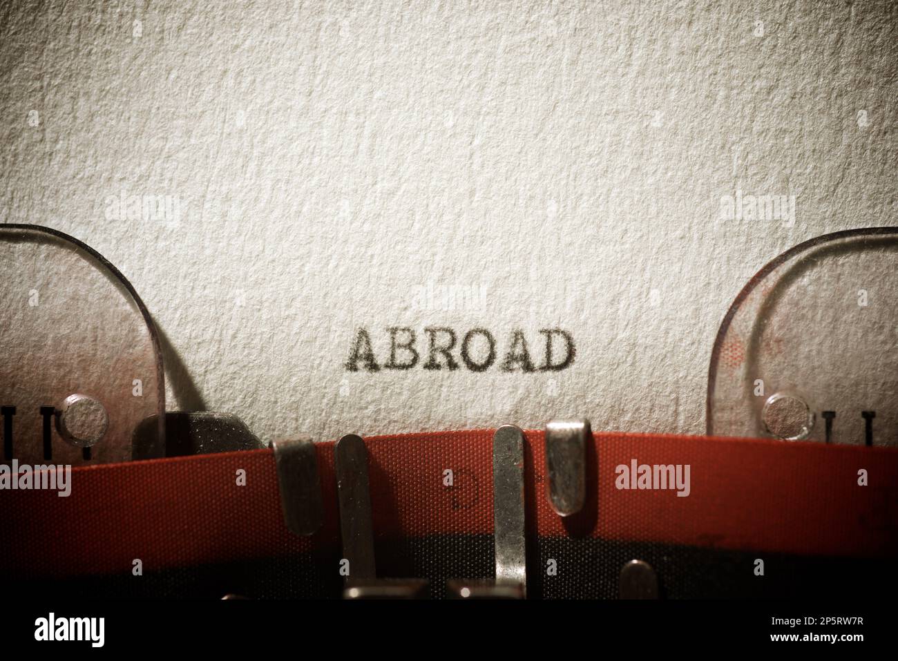 Abroad word written with a typewriter Stock Photo - Alamy