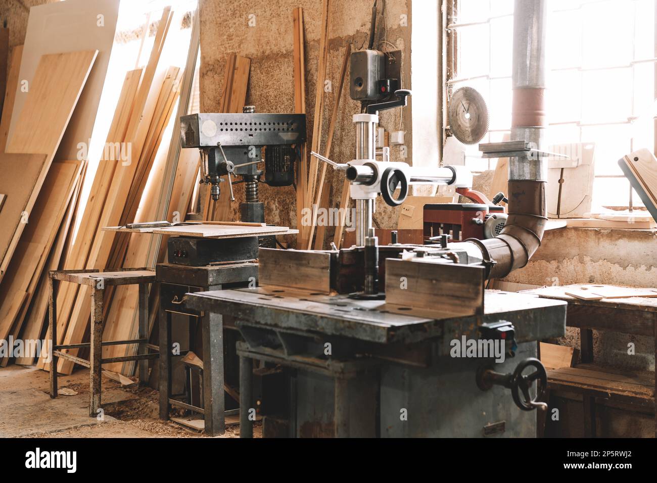 Wood working CNC machine at carpentry workshop Stock Photo - Alamy