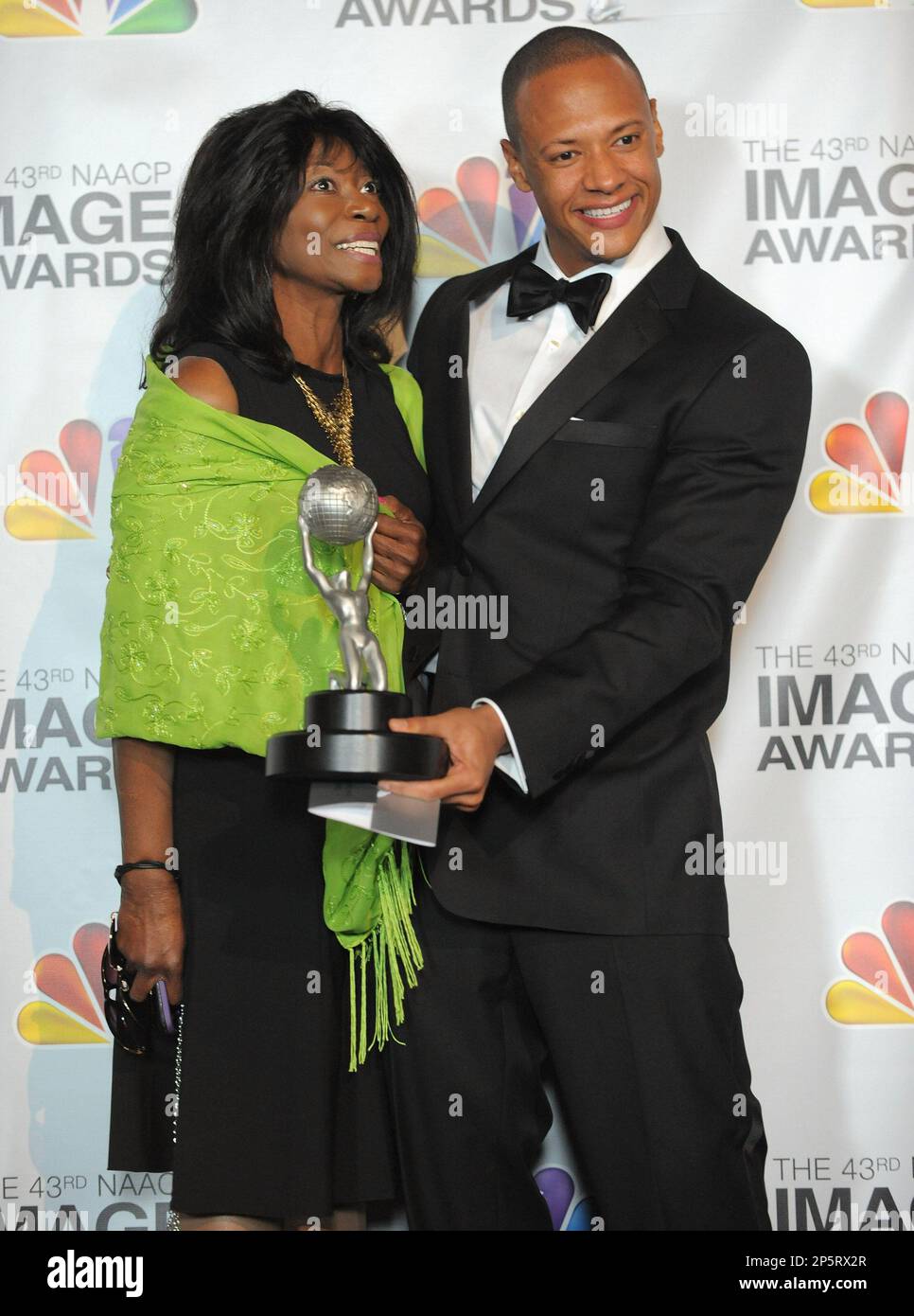 LOS ANGELES, CA - FEBRUARY 17: Actor Emerson Brooks (R) and guest pose ...