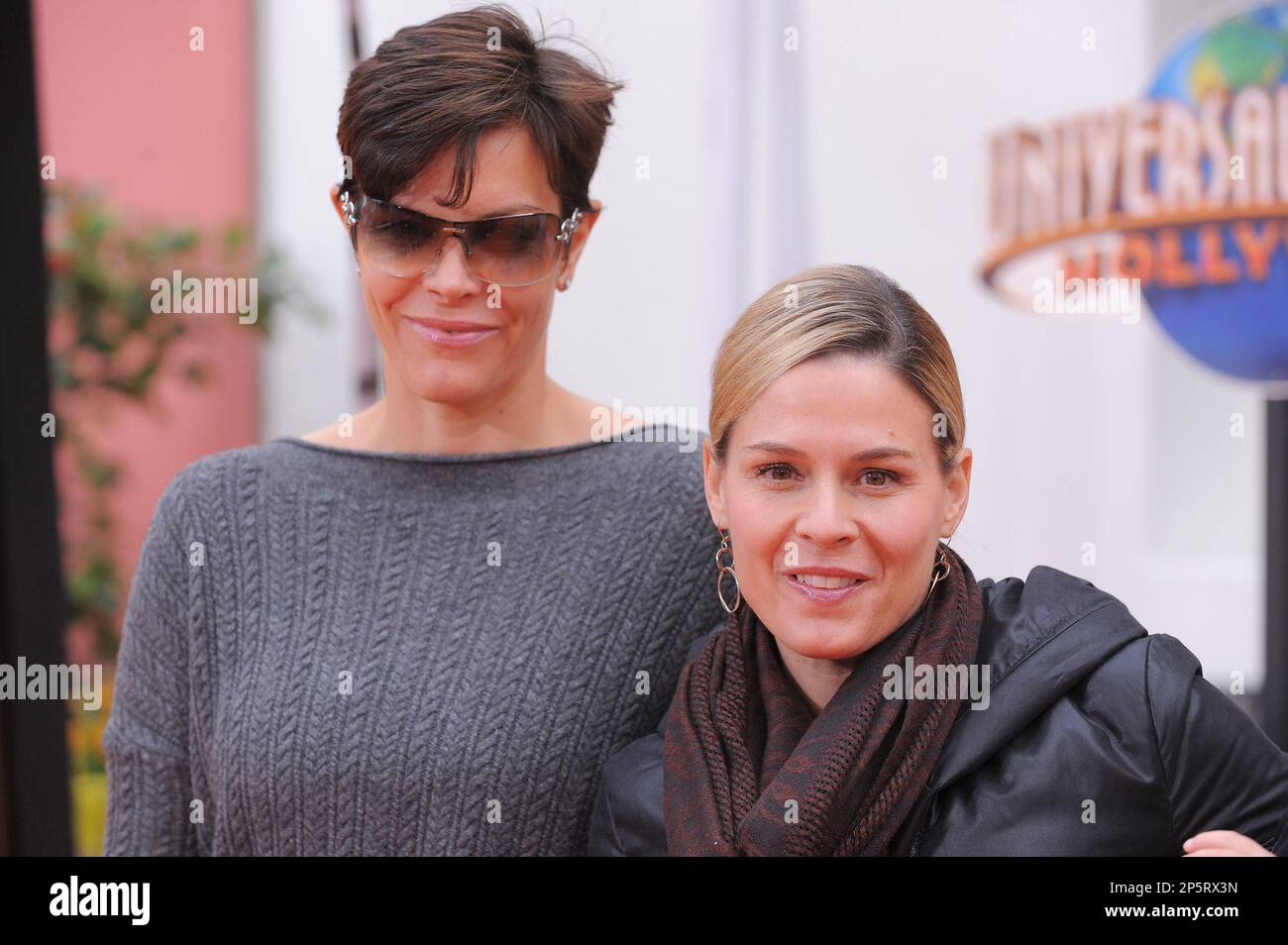 UNIVERSAL CITY, CA - FEBRUARY 19: Chef Cat Cora (R) and partner ...