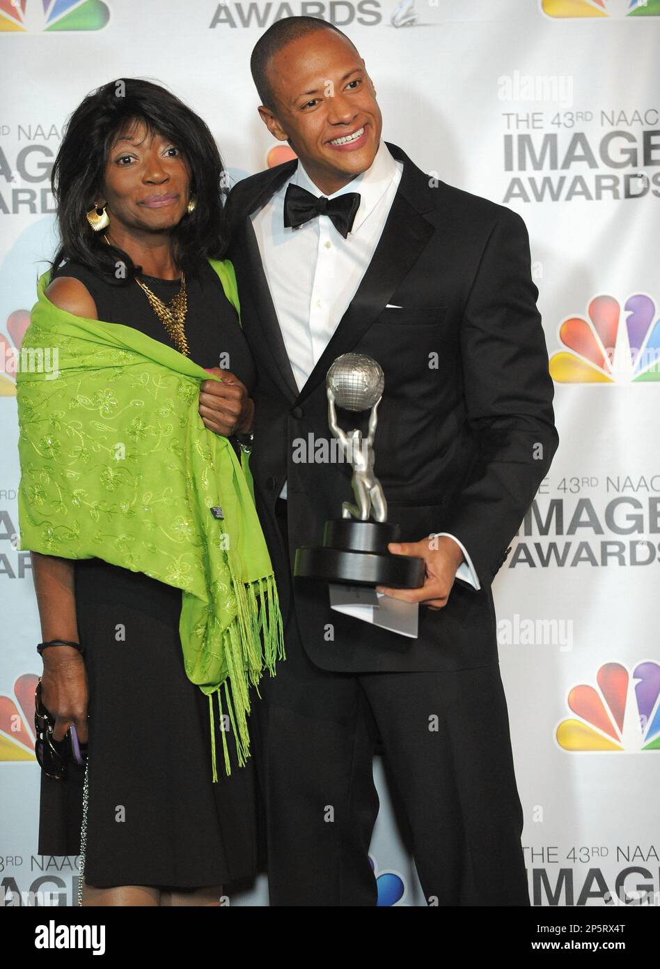 LOS ANGELES, CA - FEBRUARY 17: Actor Emerson Brooks (R) and guest pose ...