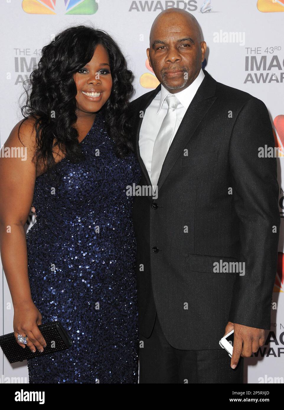 LOS ANGELES, CA - FEBRUARY 17: Actress Amber Riley and father arrive at ...