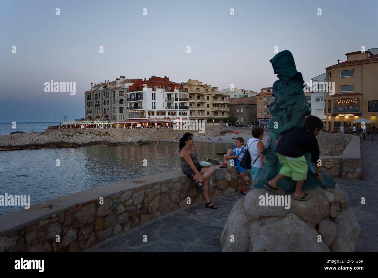L´ Escala. D´en Perris beach. At right monument to the wife of the ...