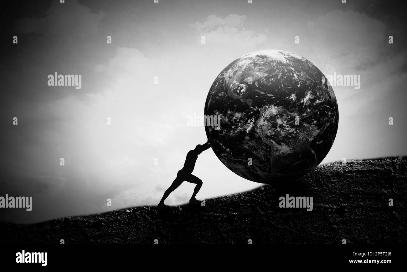 Man pushing rock uphill Black and White Stock Photos & Images - Alamy