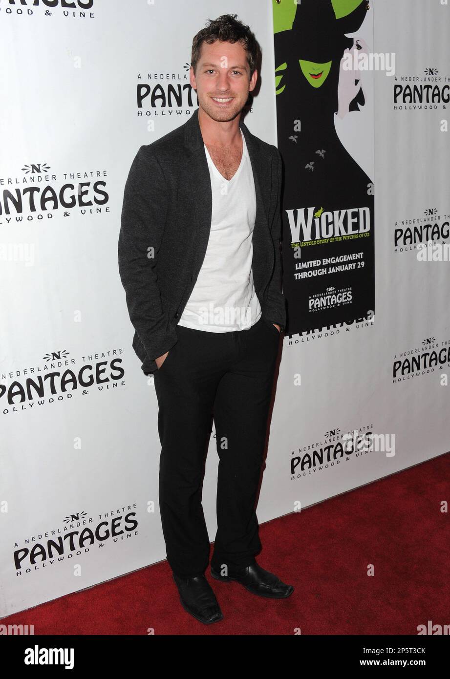 HOLLYWOOD, CA - DECEMBER 01: Tristan MacManus arrives at the "Wicked ...
