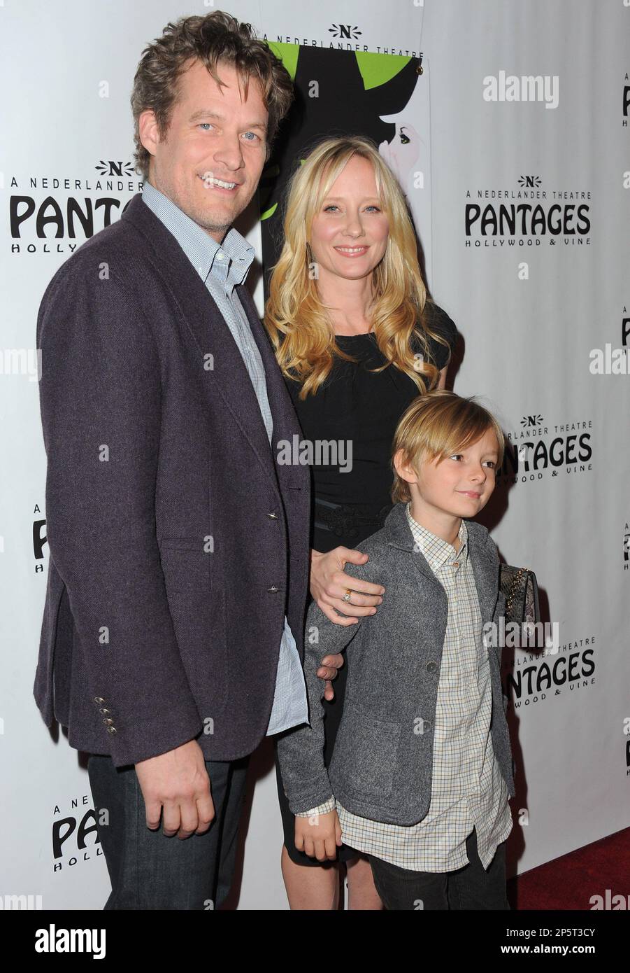 HOLLYWOOD, CA - DECEMBER 01: James Tupper and Anne Heche arrive at the ...