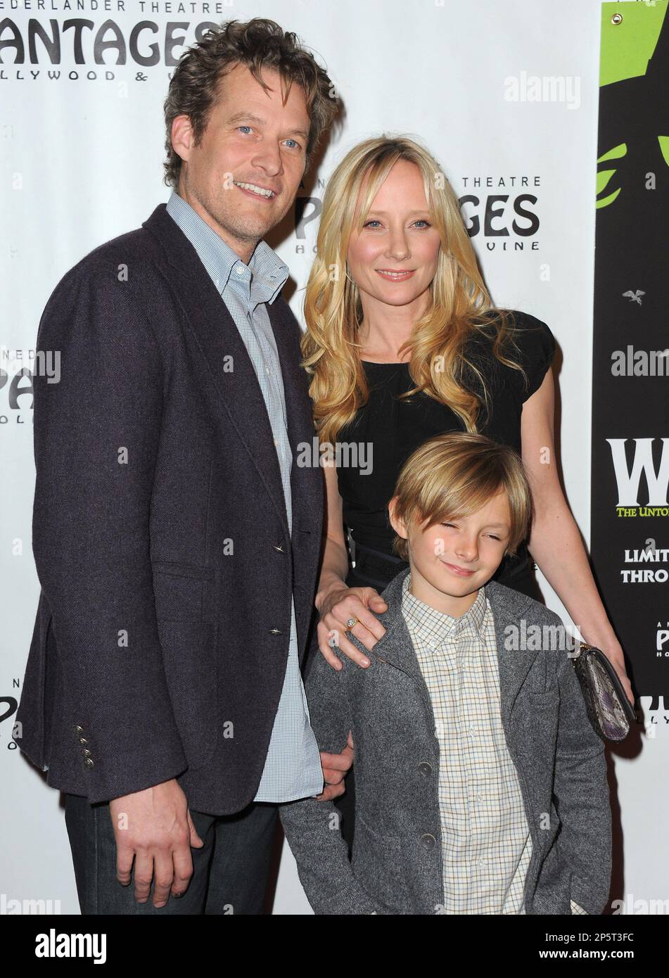 HOLLYWOOD, CA - DECEMBER 01: James Tupper and Anne Heche arrive at the ...