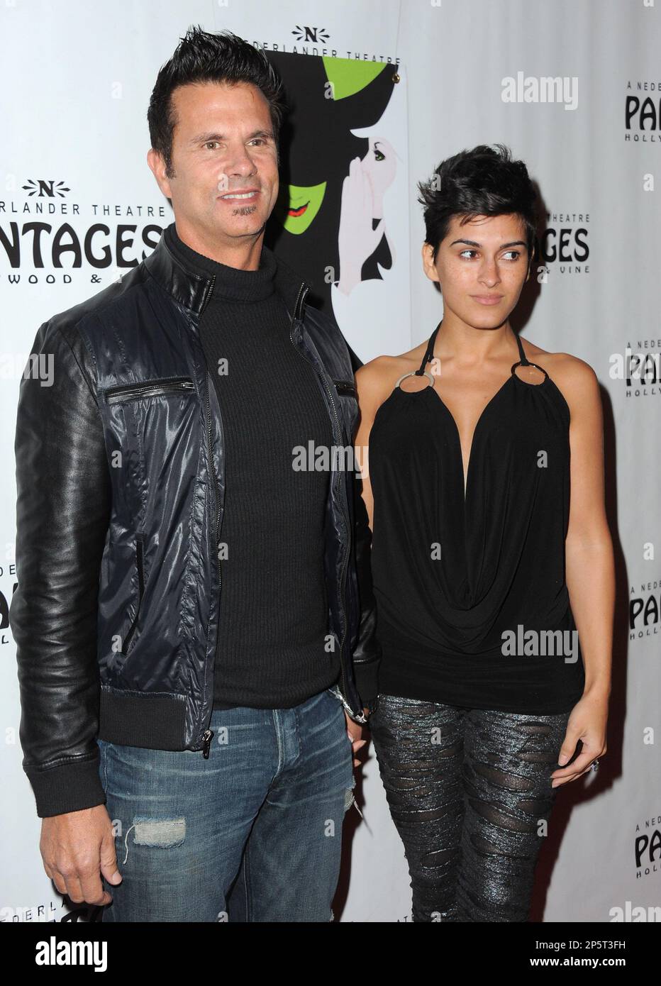 HOLLYWOOD, CA - DECEMBER 01: Lorenzo Lamas and Shawna Craig arrive at ...