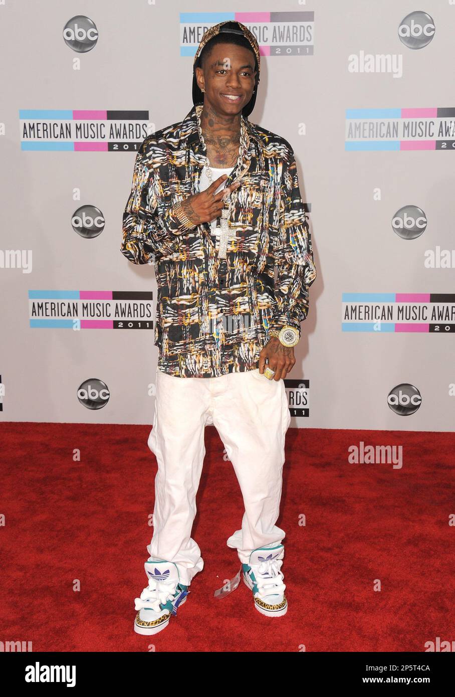 LOS ANGELES, CA - NOVEMBER 20: Rapper Soulja Boy arrives at the 2011 ...