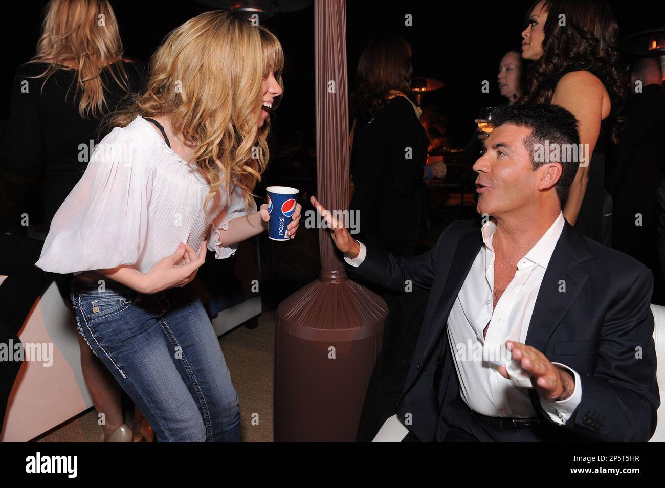 WEST HOLLYWOOD, CA - NOVEMBER 10: Drew Ryniewicz and Simon Cowell ...