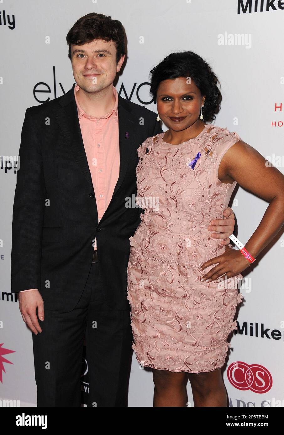 HOLLYWOOD, CA - SEPTEMBER 10: Actress Mindy Kaling (R) and David Harris ...