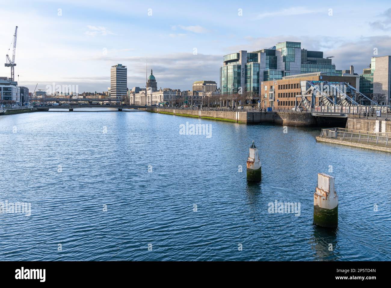 The River Liffey through Dublin, Ireland looking upstream from the Sean ...