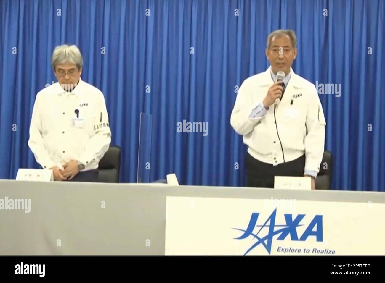 In this image made from video, Hiroshi Yamakawa, center, President of ...