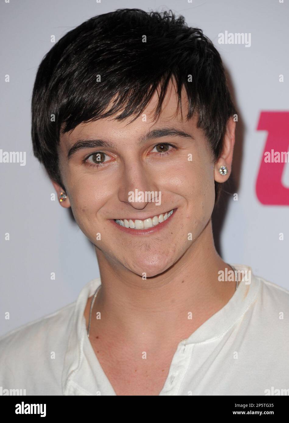 LOS ANGELES, CA - SEPTEMBER 23: Actor Mitchel Musso arrives at the 9th ...