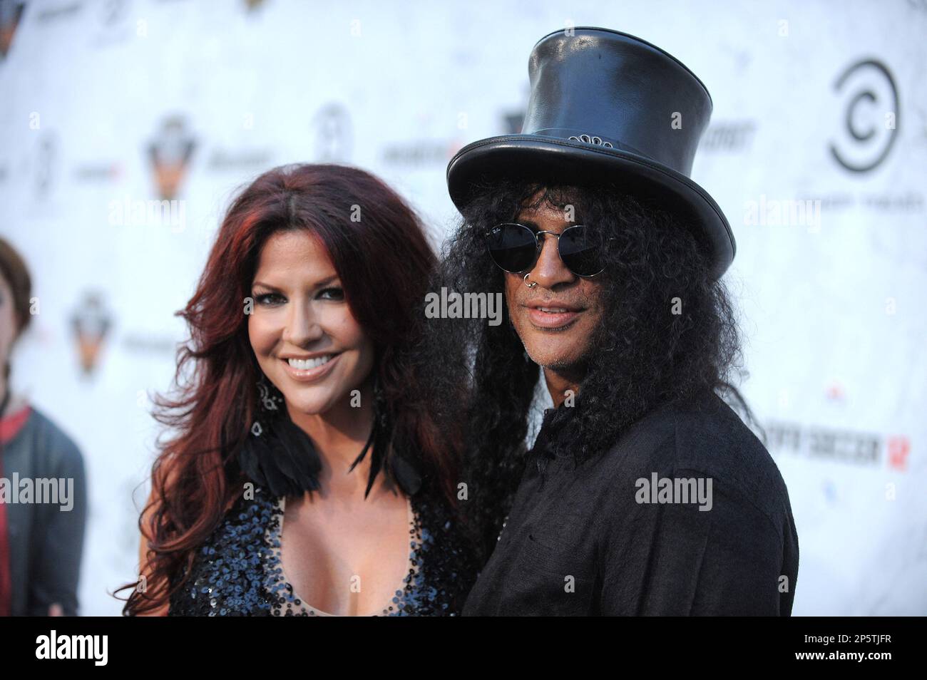 LOS ANGELES, CA - SEPTEMBER 10: Perla Ferrar and Slash arrive at the ...