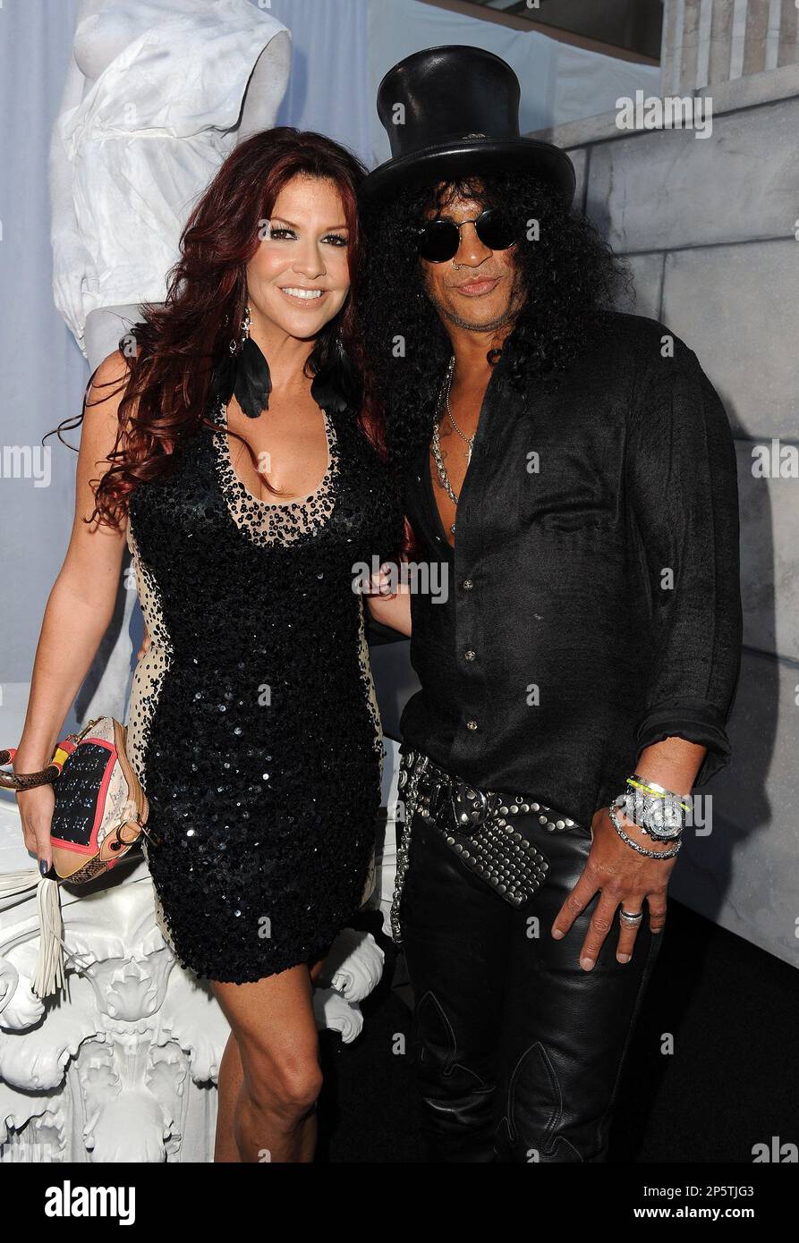 LOS ANGELES, CA - SEPTEMBER 10: Perla Ferrar and Slash arrive at the ...