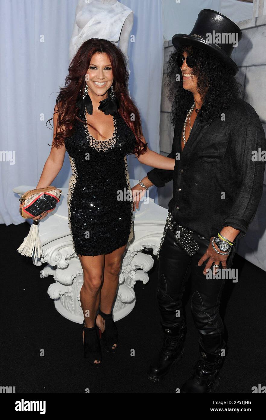 LOS ANGELES, CA - SEPTEMBER 10: Perla Ferrar and Slash arrive at the ...