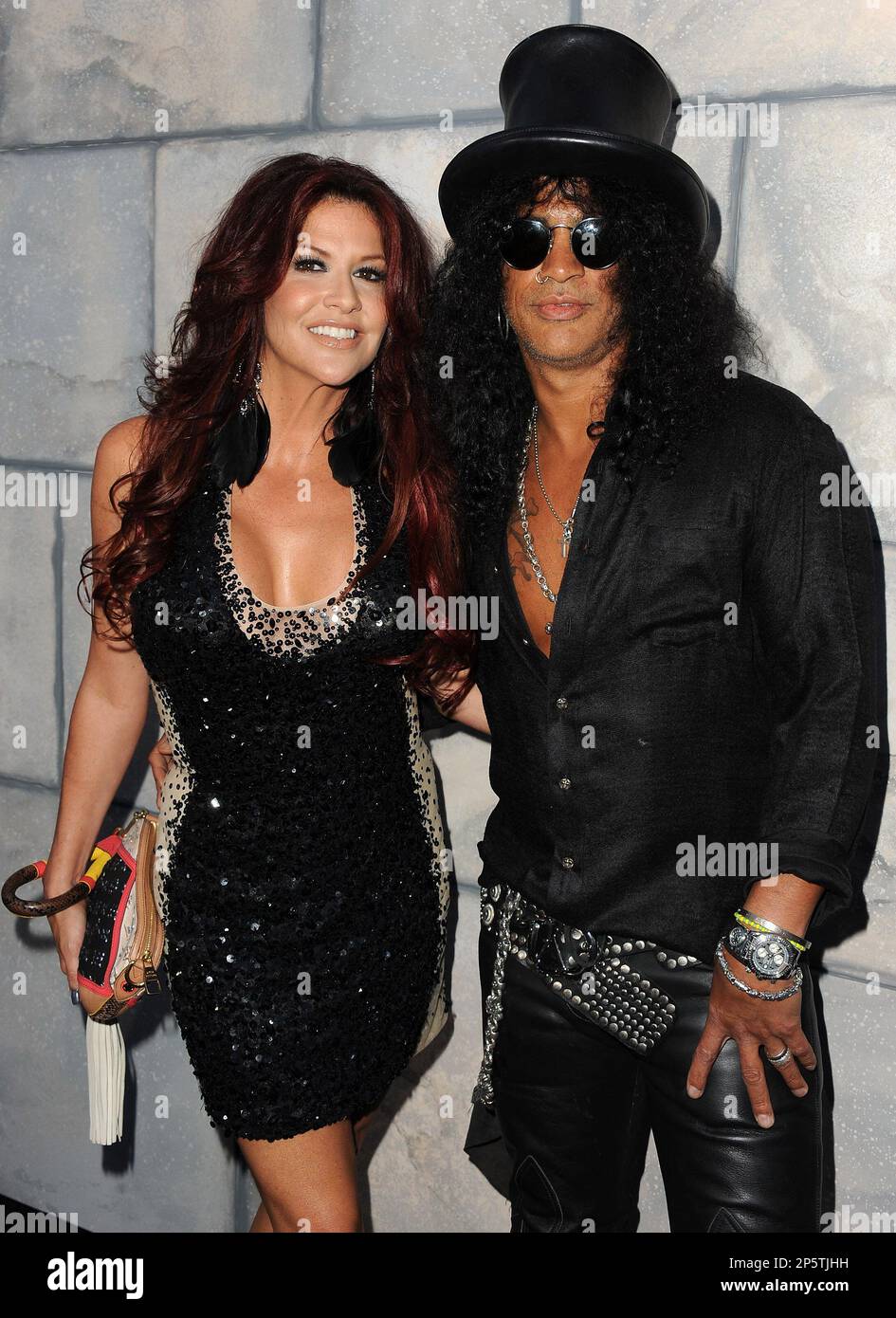 LOS ANGELES, CA - SEPTEMBER 10: Perla Ferrar and Slash arrive at the ...